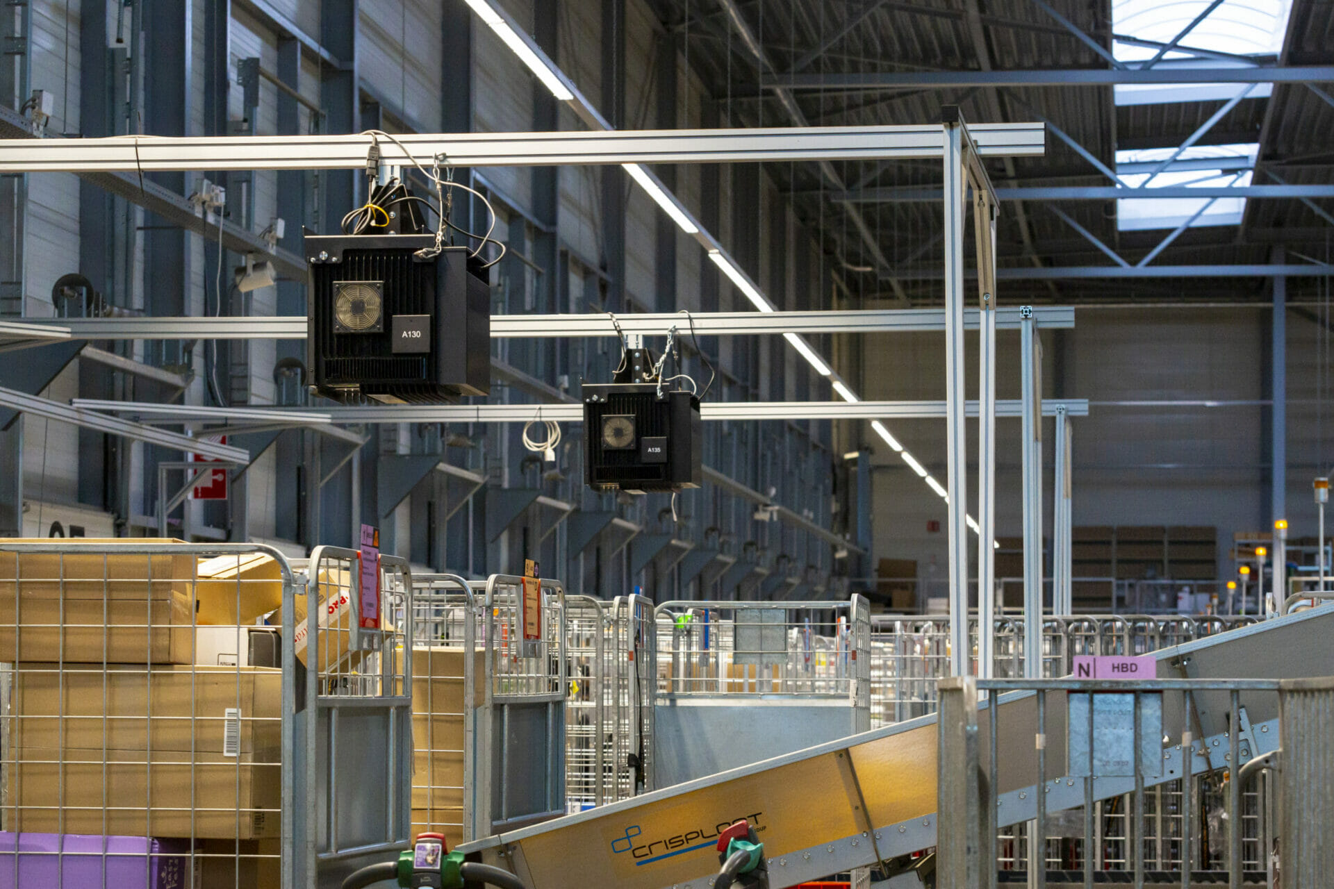 Warehouse staff and robots work hand in hand to meet demand ...